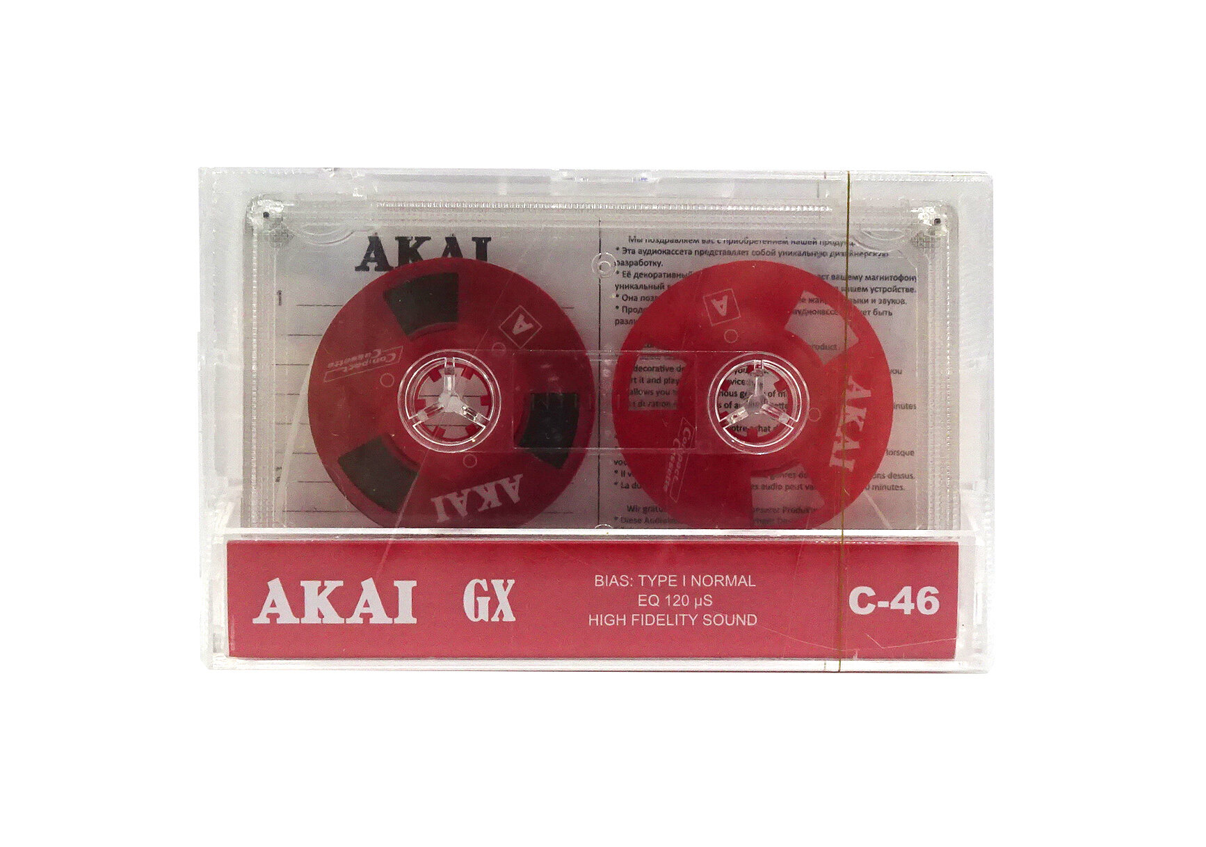 Аудиокассета AKAI с красными бобинами и 3-я отверстиями