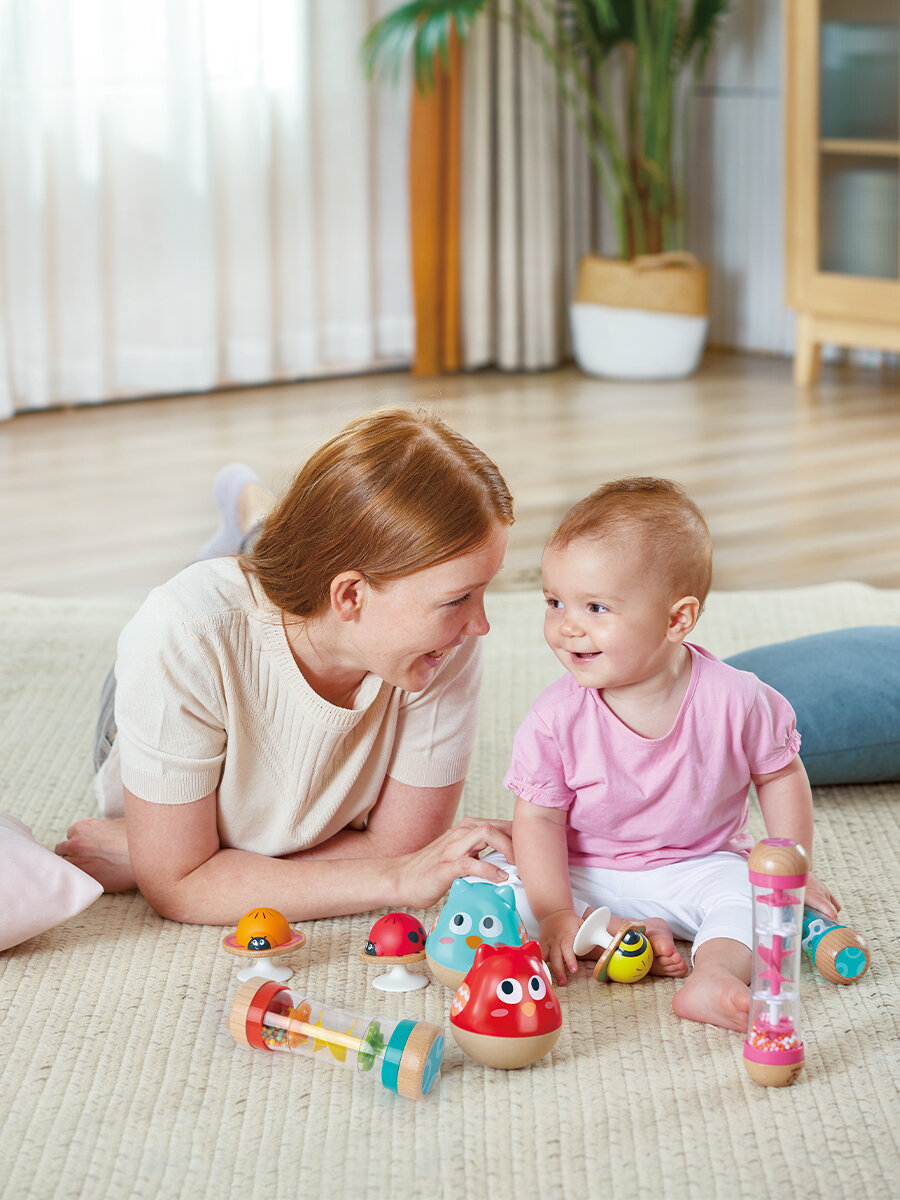 Музыкальная игрушка - неваляшка Hape "Совенок", цвет красный E0112_HP