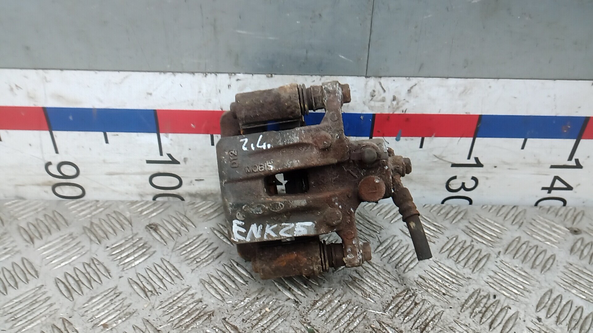 Суппорт тормозной задний левый HYUNDAI IX35 1, Номер 582102Y310, 583102YA31