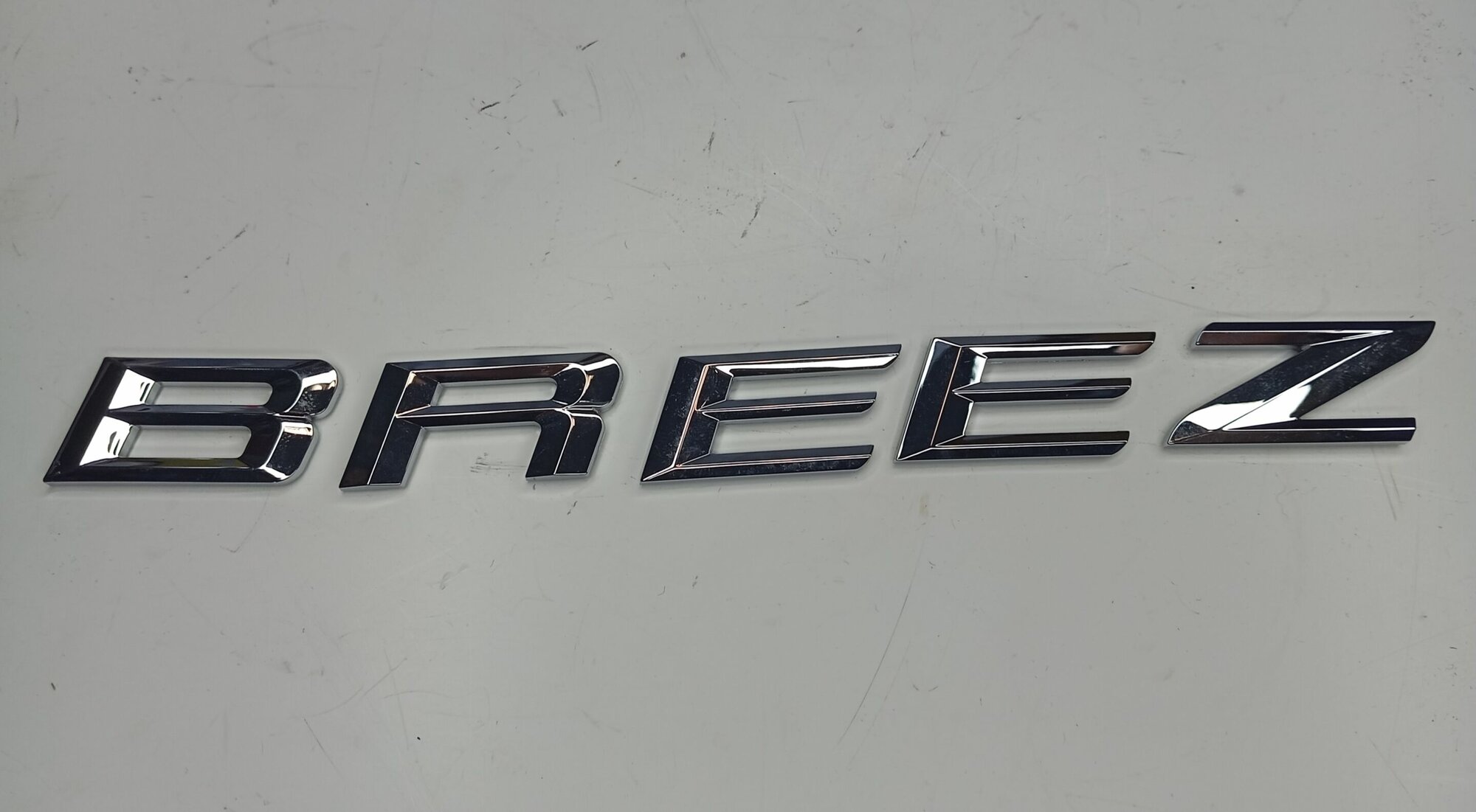 Эмблема Lifan Breez [1.6 16V 5MT седан] L3921019B2