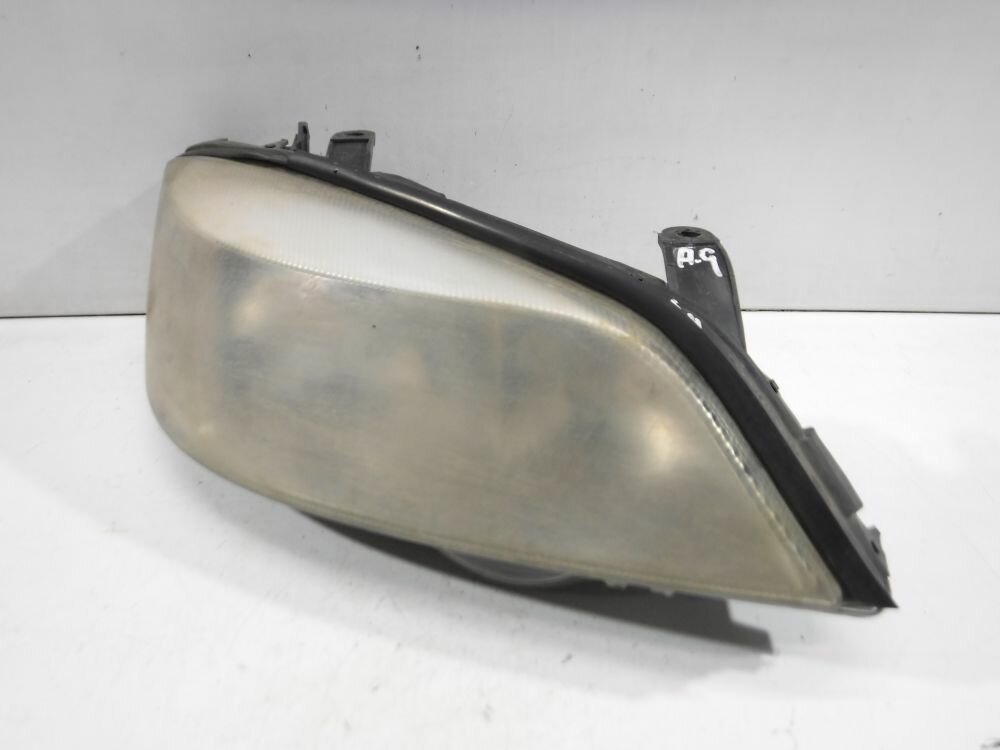 Фара правая Opel Astra G 90520878
