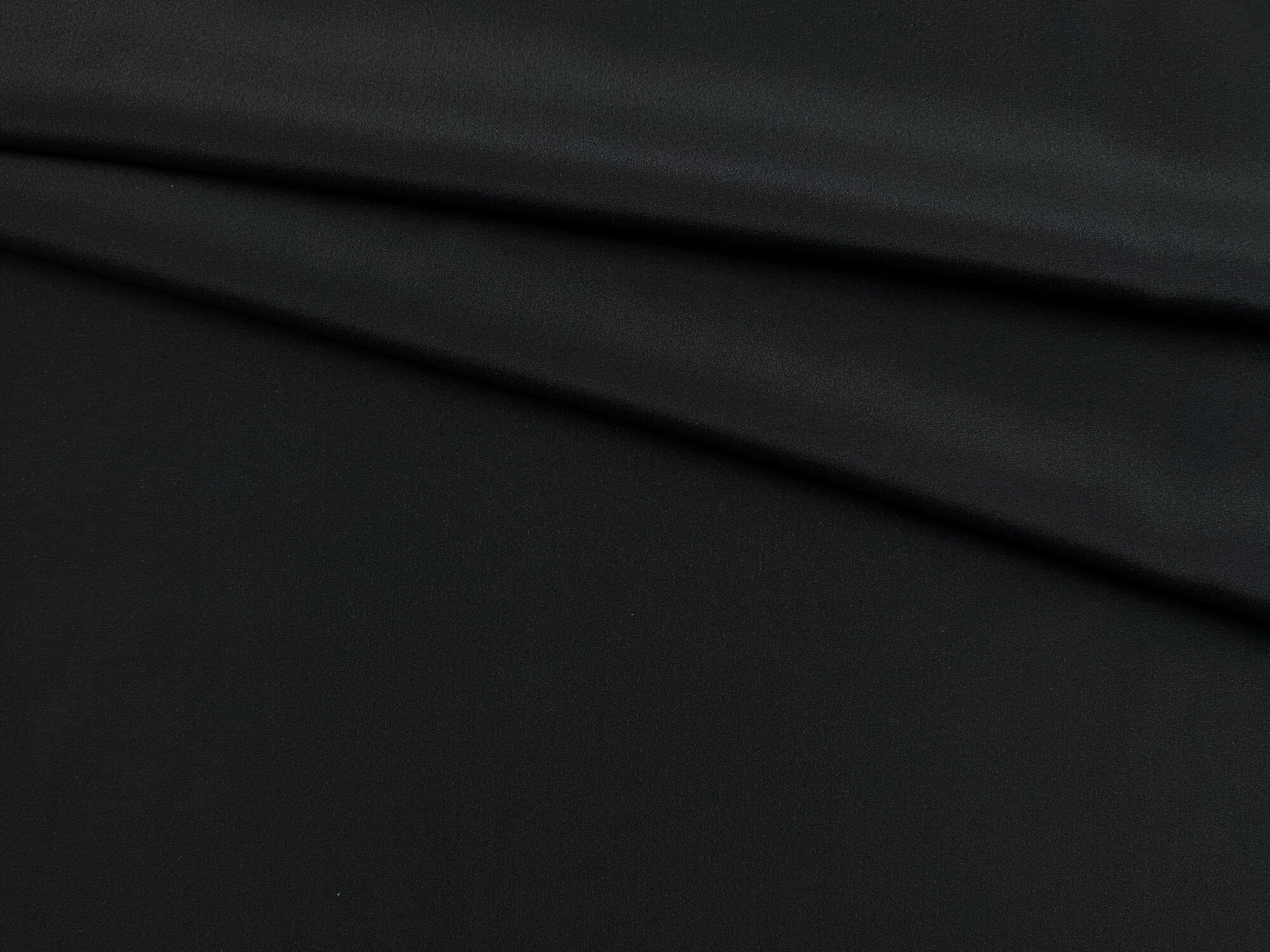 Ткань Крепдешин чёрного цвета однотонная 46671