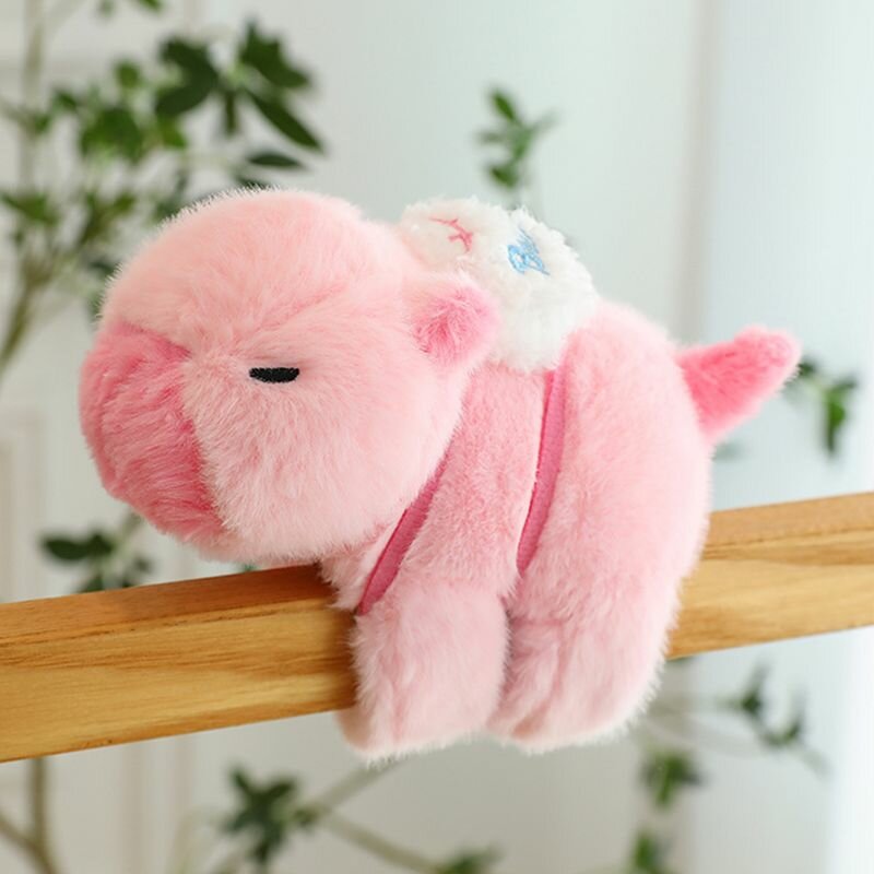 Мягкая игрушка розов Браслет Капибара с рюкзаком 25CM