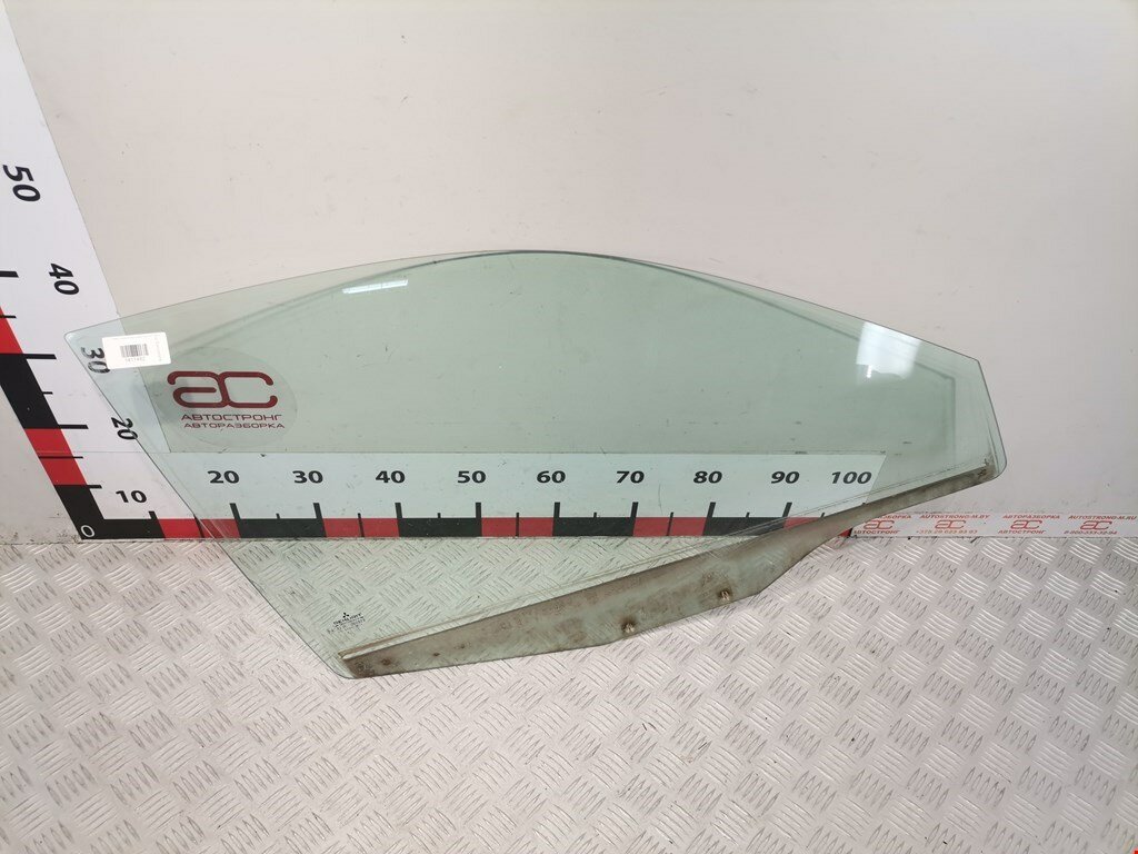Стекло двери передней правой Mitsubishi Carisma MR720213 арт. 1417482
