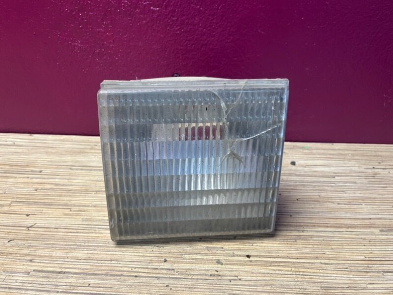 Фара галогеновая передняя левая Lincoln Town Car 7894561