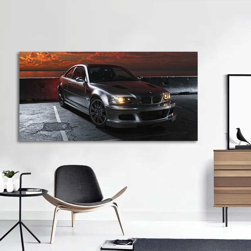 Картина на холсте «BMW: декоративная композиция на вечерней парковке у моря, фары», узкий формат 40×80 см