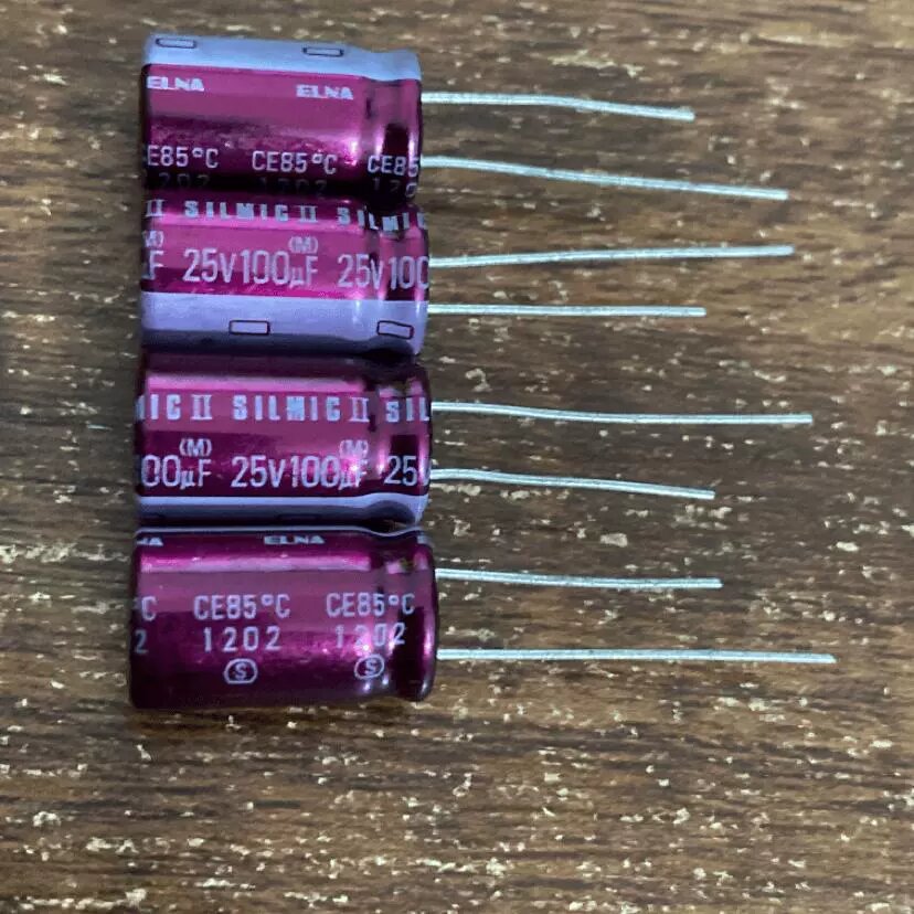 Электролитические конденсаторы ELNA SILMIC 25V100UF 100UF25V Audio Filter 1шт цена