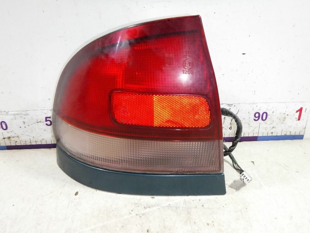 Фонарь задний левый Mazda 626 GE 8DGX51160