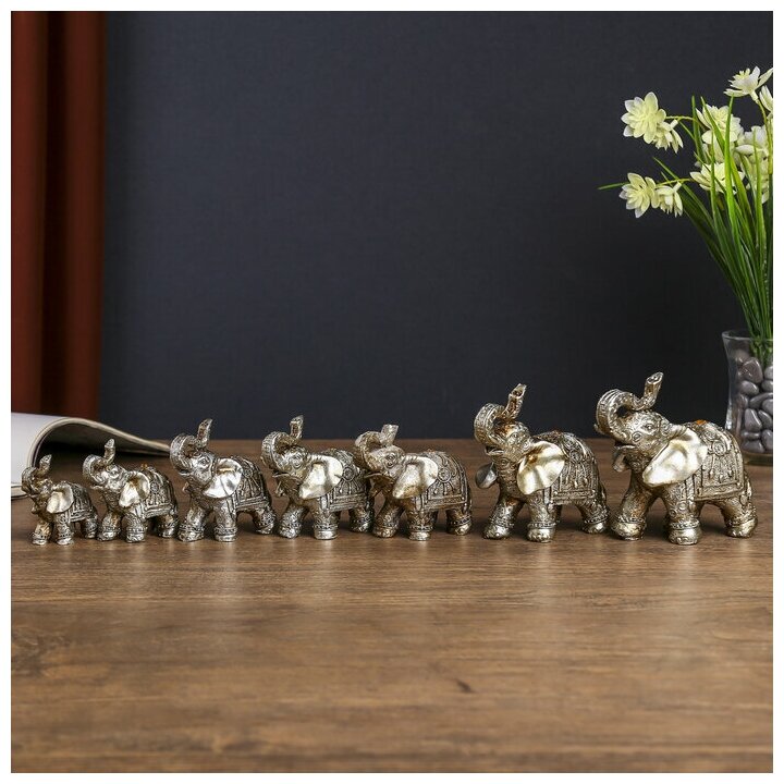 Сувенир полистоун "Семь слонов в попонах с пышным цветком" h-10;9;8;7;6;5;4 см