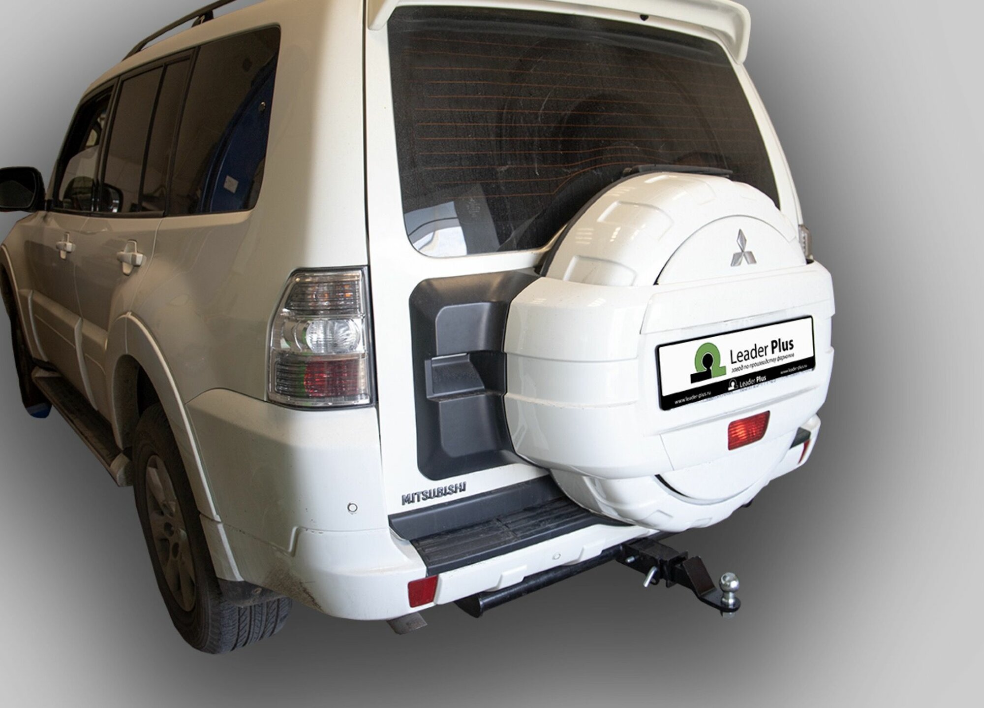 Фаркоп Лидер-плюс для Mitsubishi Pajero 2000-2020 без снятия и выреза бампера. Тип шара: E. Нагрузки: 1500/100 кг,(без электрики в комплекте) - M114-E