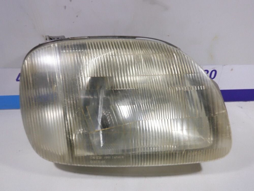 Фара правая Nissan March 2601072B25