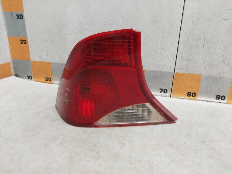 Б/У Дефекты, америка, оригинал, седан Фонарь задний левый Ford Focus 2001 1 468798 FORD арт. YS4X13441CA
