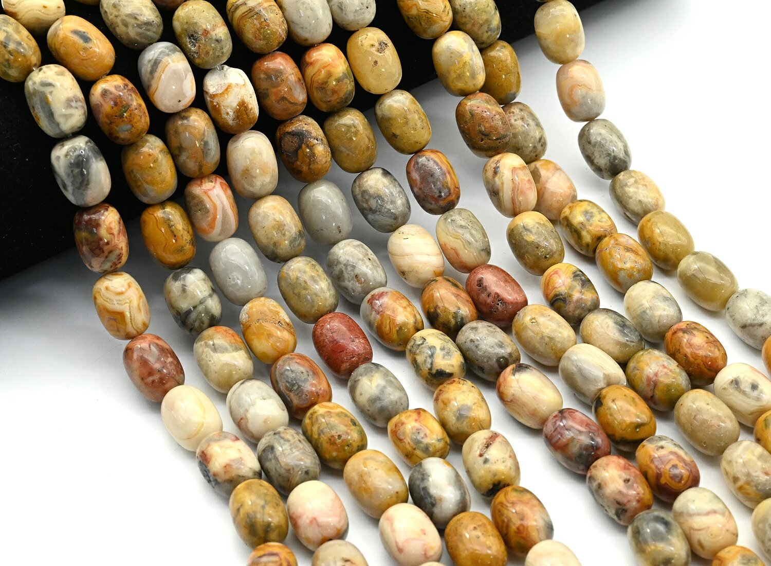 Бусины из агата львиная шкура бочонок 10*14мм, 39см, 28 бусин .