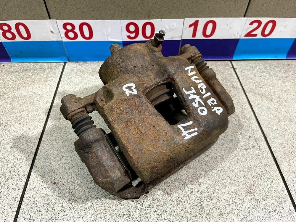 Суппорт передний левый Daewoo Nubira
