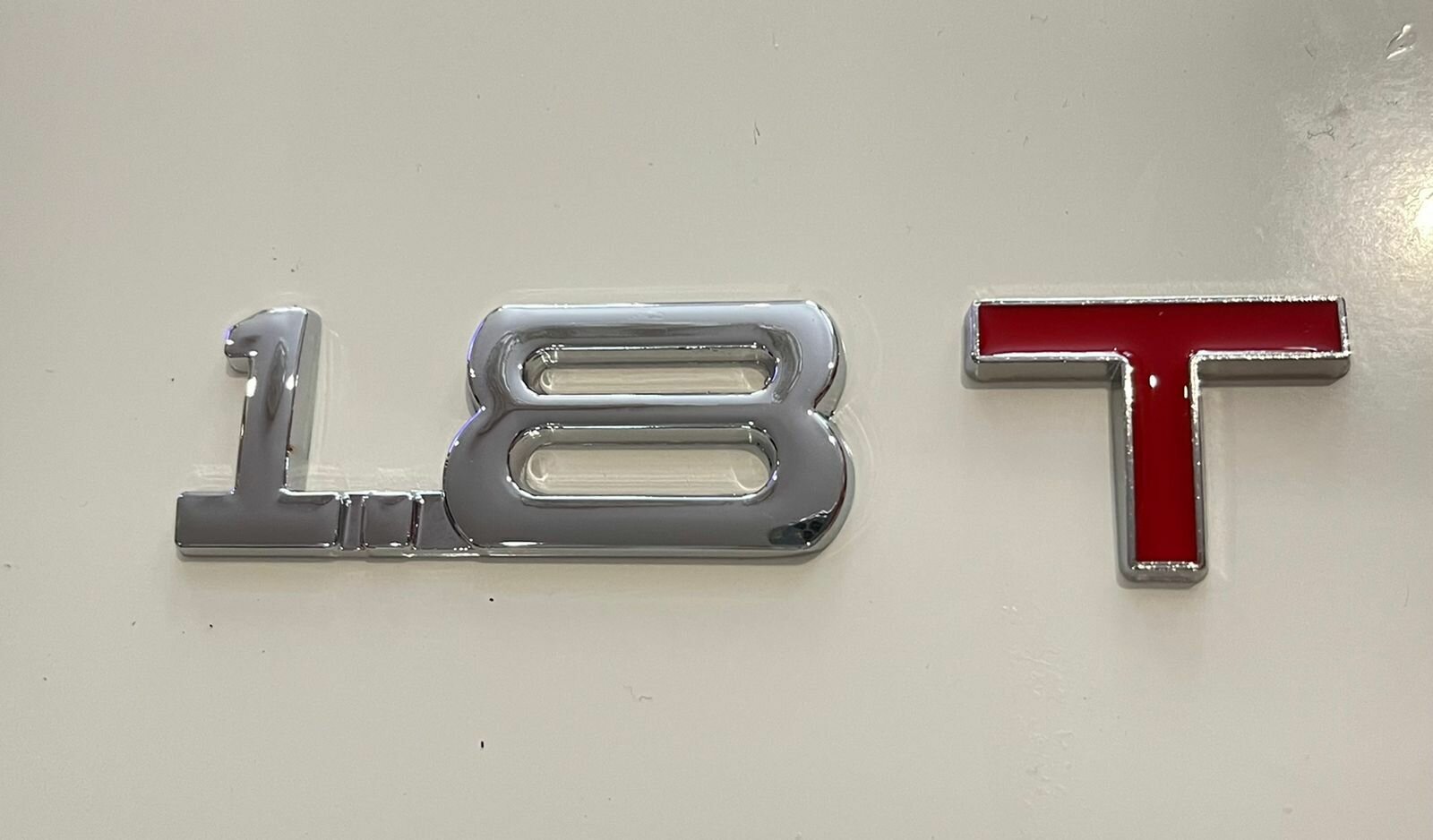 Шильдик / надпись на эмблемах 1.8T