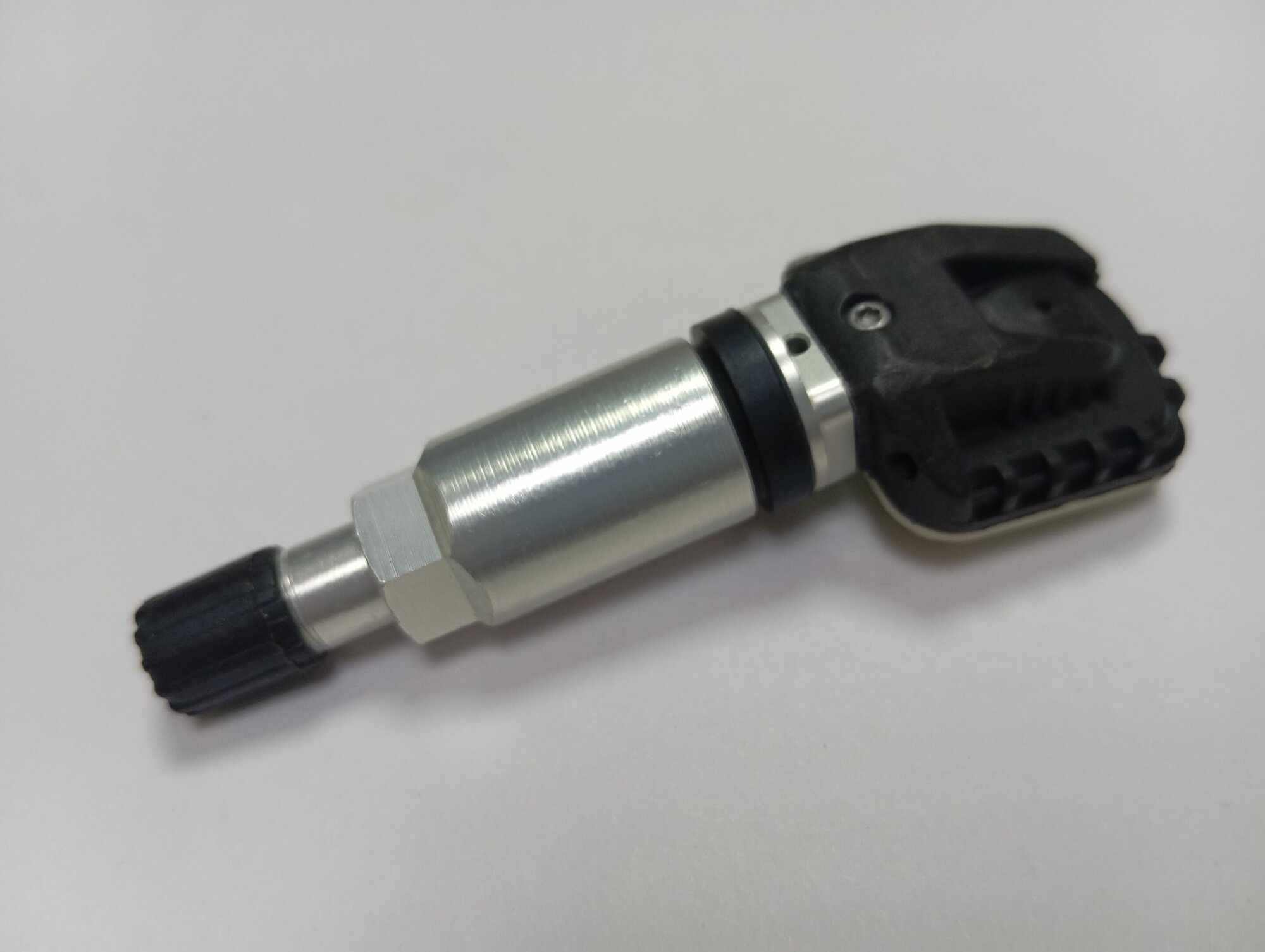 Датчик давления в шине с вентилем Geely Atlas Pro [1.5 12V 6AT внедорожник 4X2] 7091004000