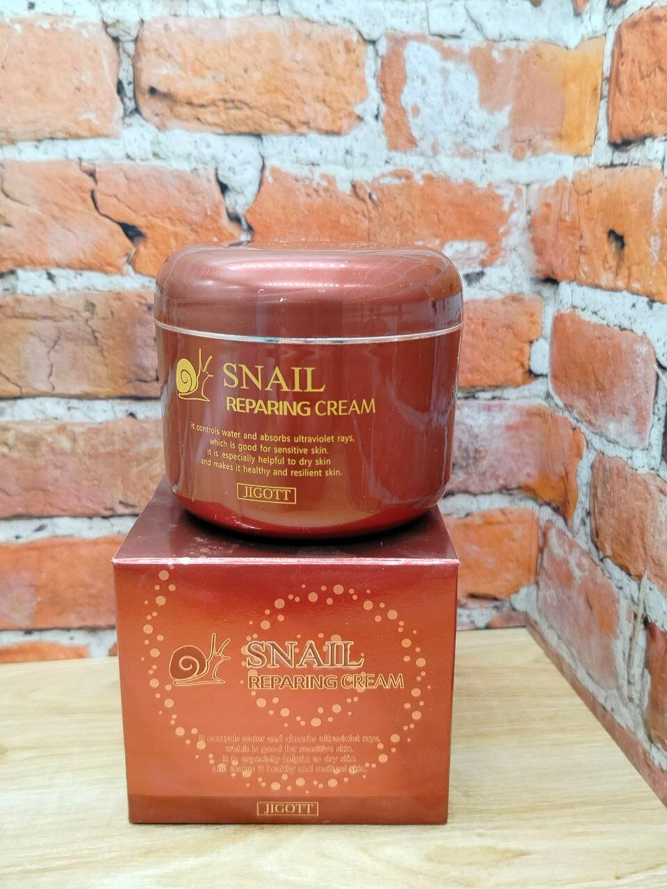 Jigott Snail Repeiring Cream Мультифункциональный крем для лица 100 мл