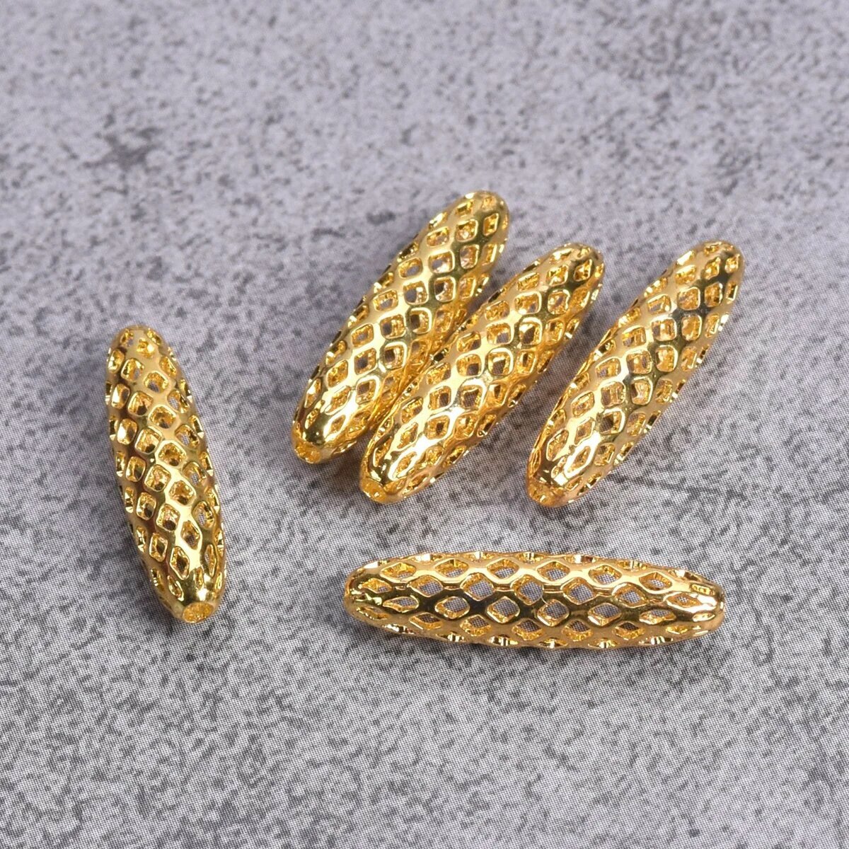 Металлические бусины Dreamzeal овальные латунные золотые/серебряные 10 шт. 19x5mm, Gold Color