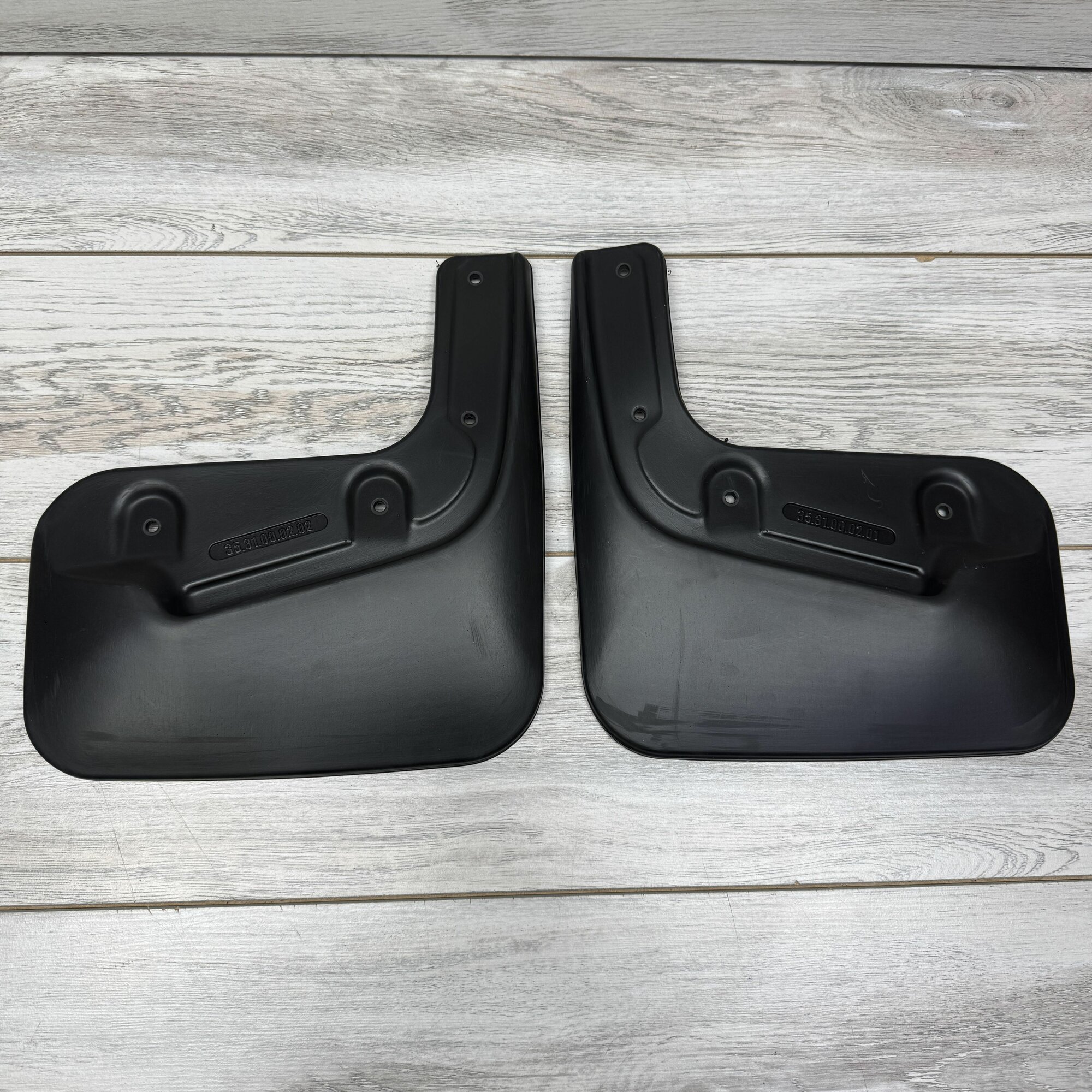 Брызговики Mitsubishi L200 2019-2022 задние (Митсубиши)