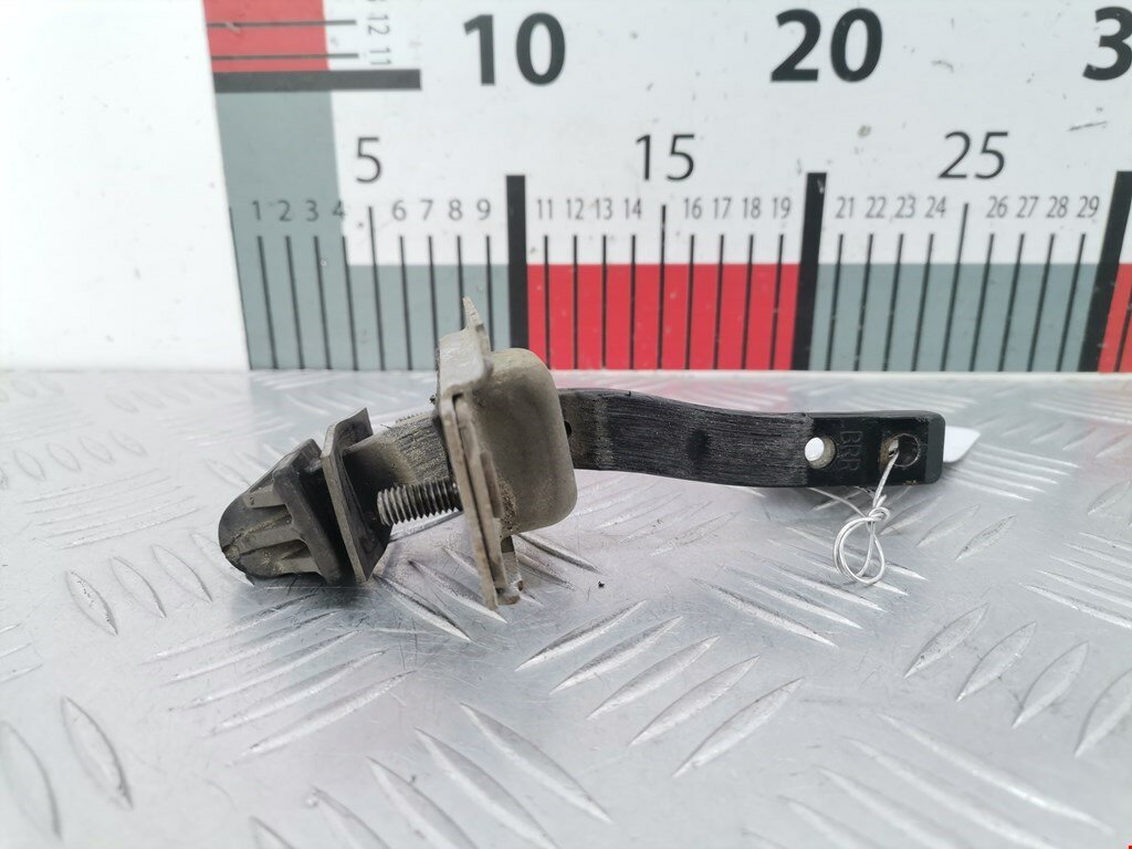 Ограничитель открывания двери задней Mazda 323 BJ B25D72270B арт. 2087860