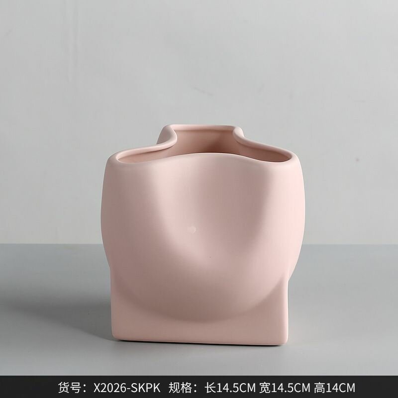 Простой скандинавский керамический вазон в стиле Моренди для декорации.