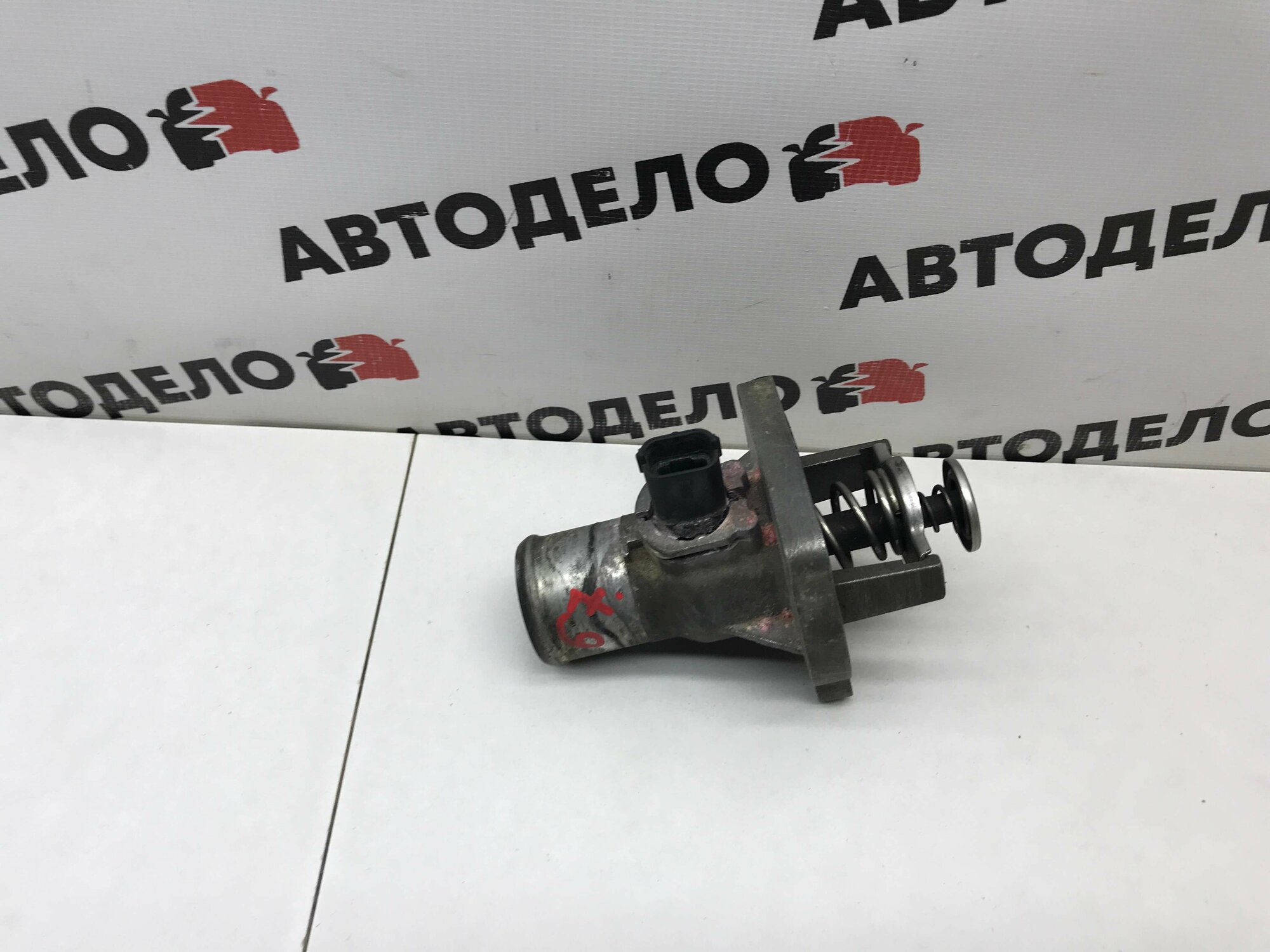 Корпус термостата Opel Astra 24405922