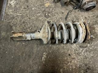 Стойка амортизатора Kia Spectra 1 поколение [2-Й рестайлинг] 1.6 S6D 2007 перед. лев. (б/у)