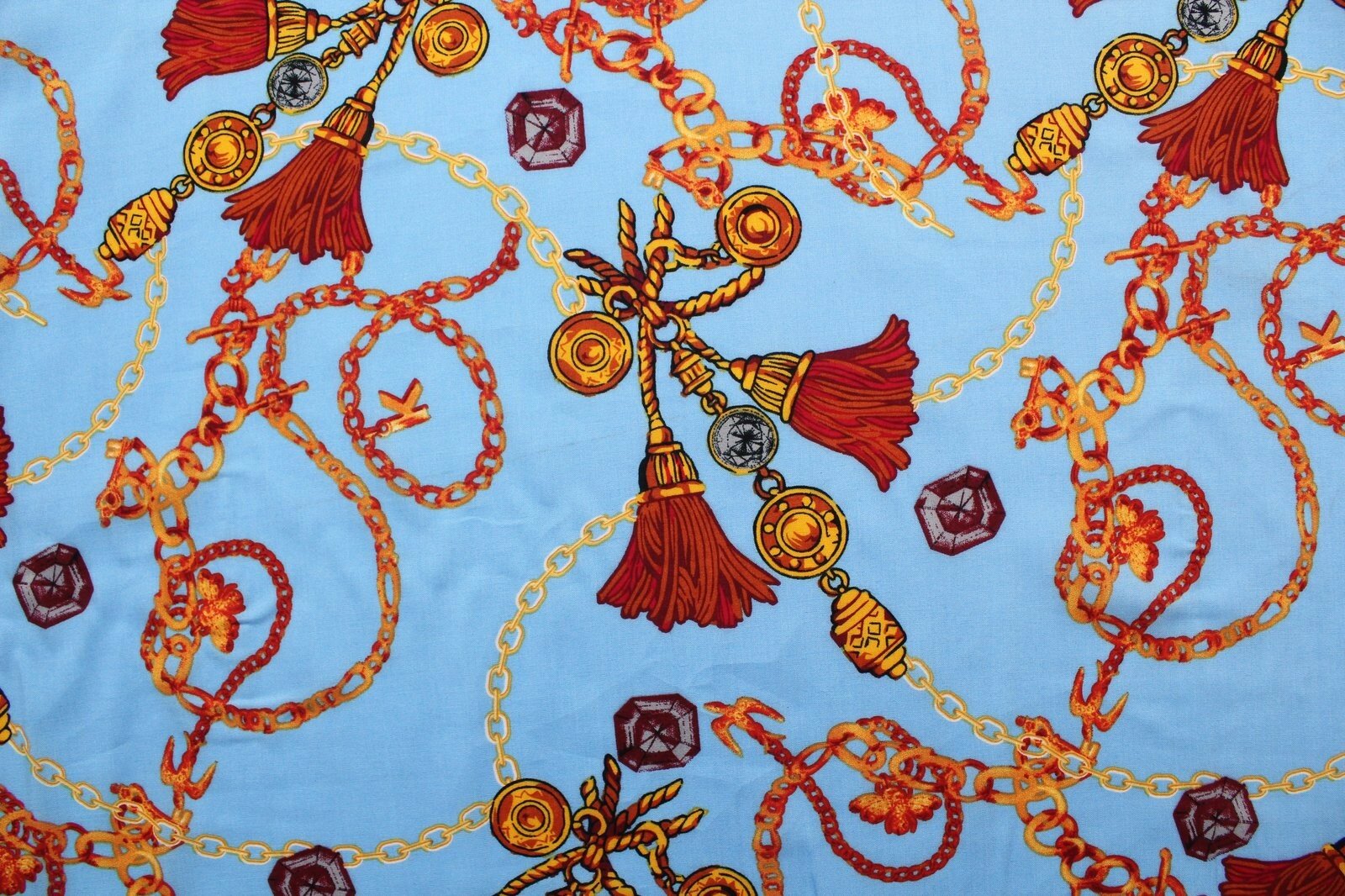 Ткань Вискоза блузочно-плательная красно-золотые цепочки на голубом, ш140см, 0,5 м