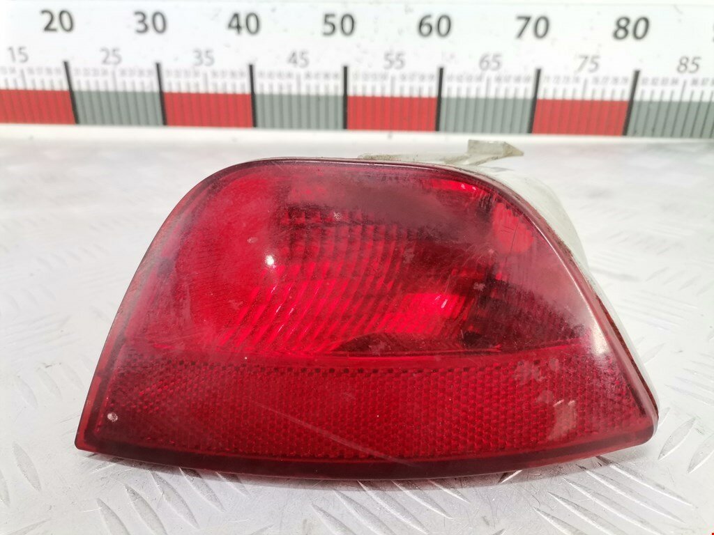 Фонарь противотуманный левый Ford Focus 1 XS4115K273A арт. 1645031