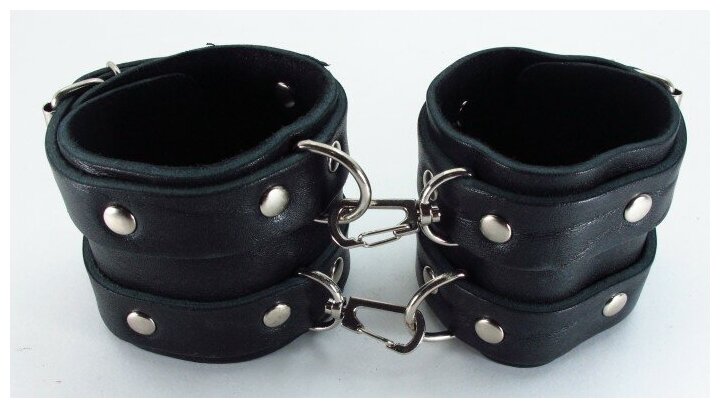 Наручники БДСМ Арсенал широкие с двумя ремешками из натуральной кожи черного цвета для надежной фиксации