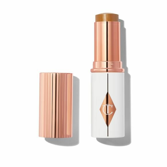 Charlotte Tilbury Тональный крем в стике Unreal Skin Sheer Glow Tint, 12 tan