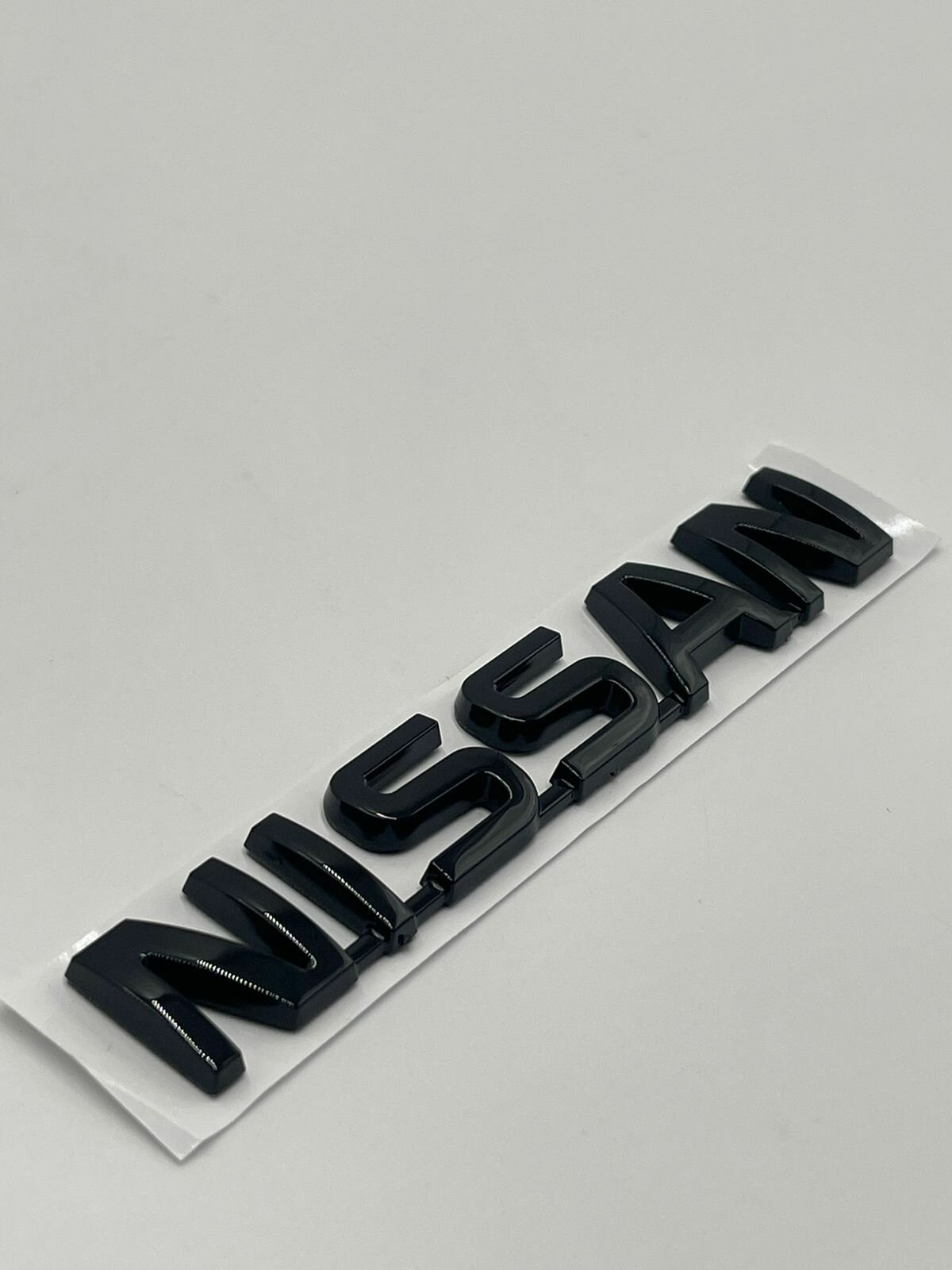 Надпись Наклейка знак Шильдик Nissan Black 12см