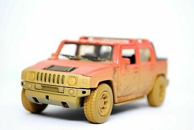 Модель машины KINSMART "Hummer H2 SUT (Muddy)" инерция 1:36