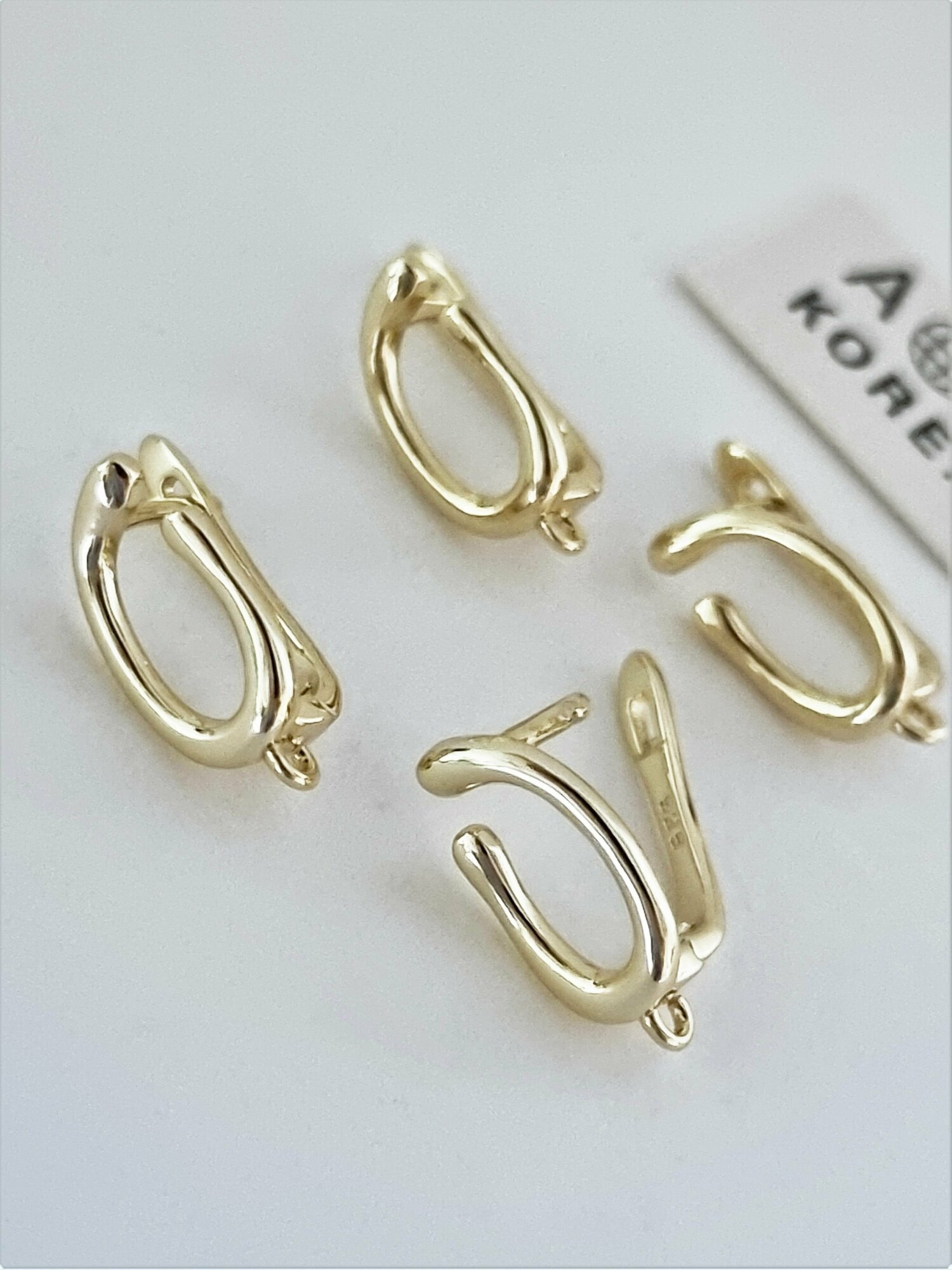 Швензы с английским замком "Овалы с разрывом". Золотой родий. 2пары.