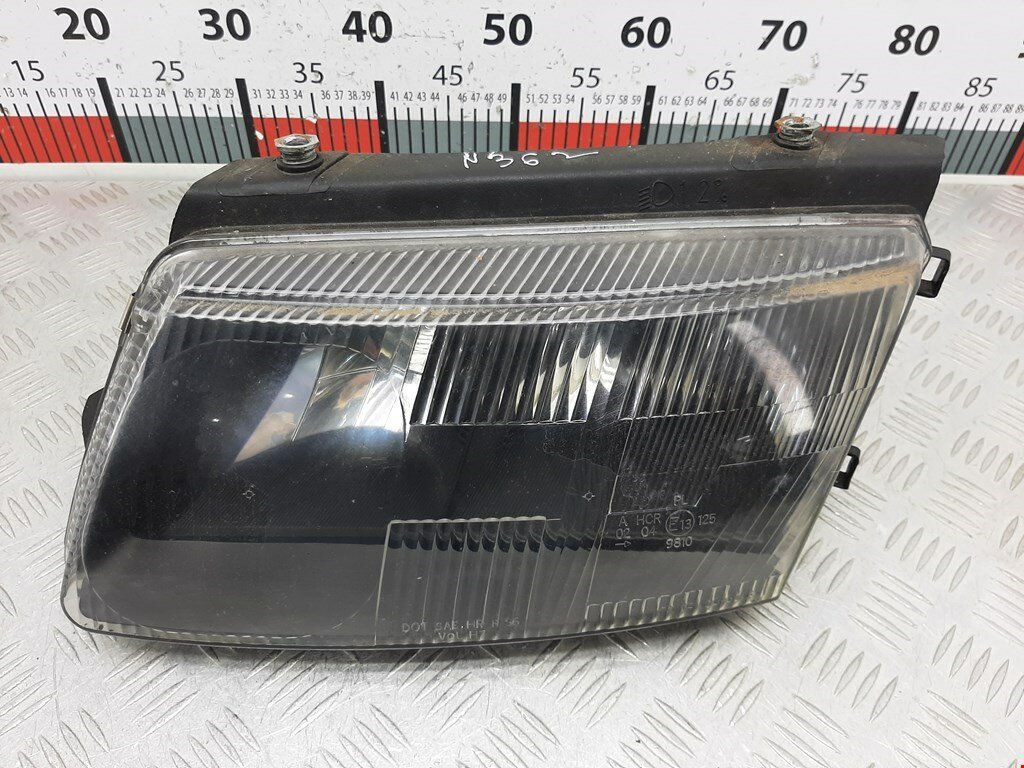 Фара левая Volkswagen Passat 5 205080B арт. 2093438