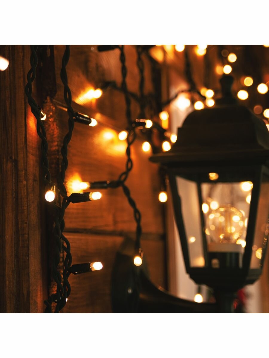 Уличная светодиодная гирлянда Uniel бахрома 220V теплый белый ULD-B3010-200/TBK Warm White IP67 теплый.