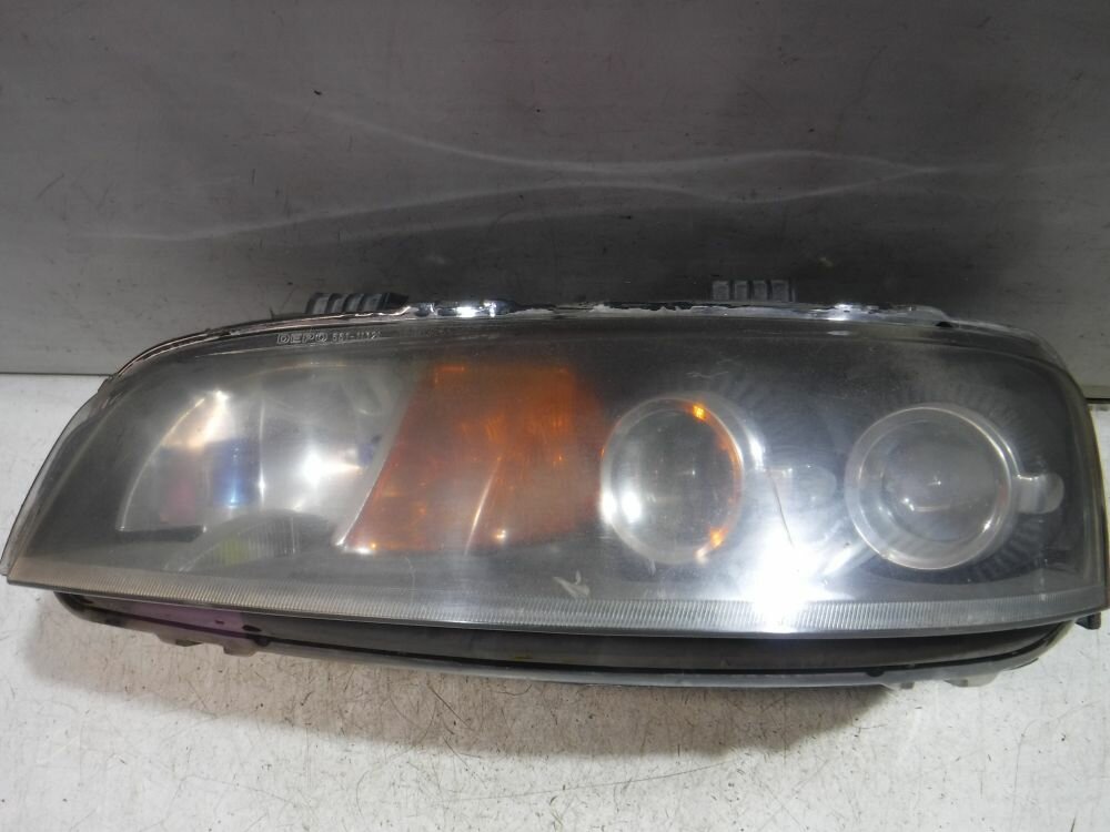 Фара левая Fiat Punto II 6611132LLDEM