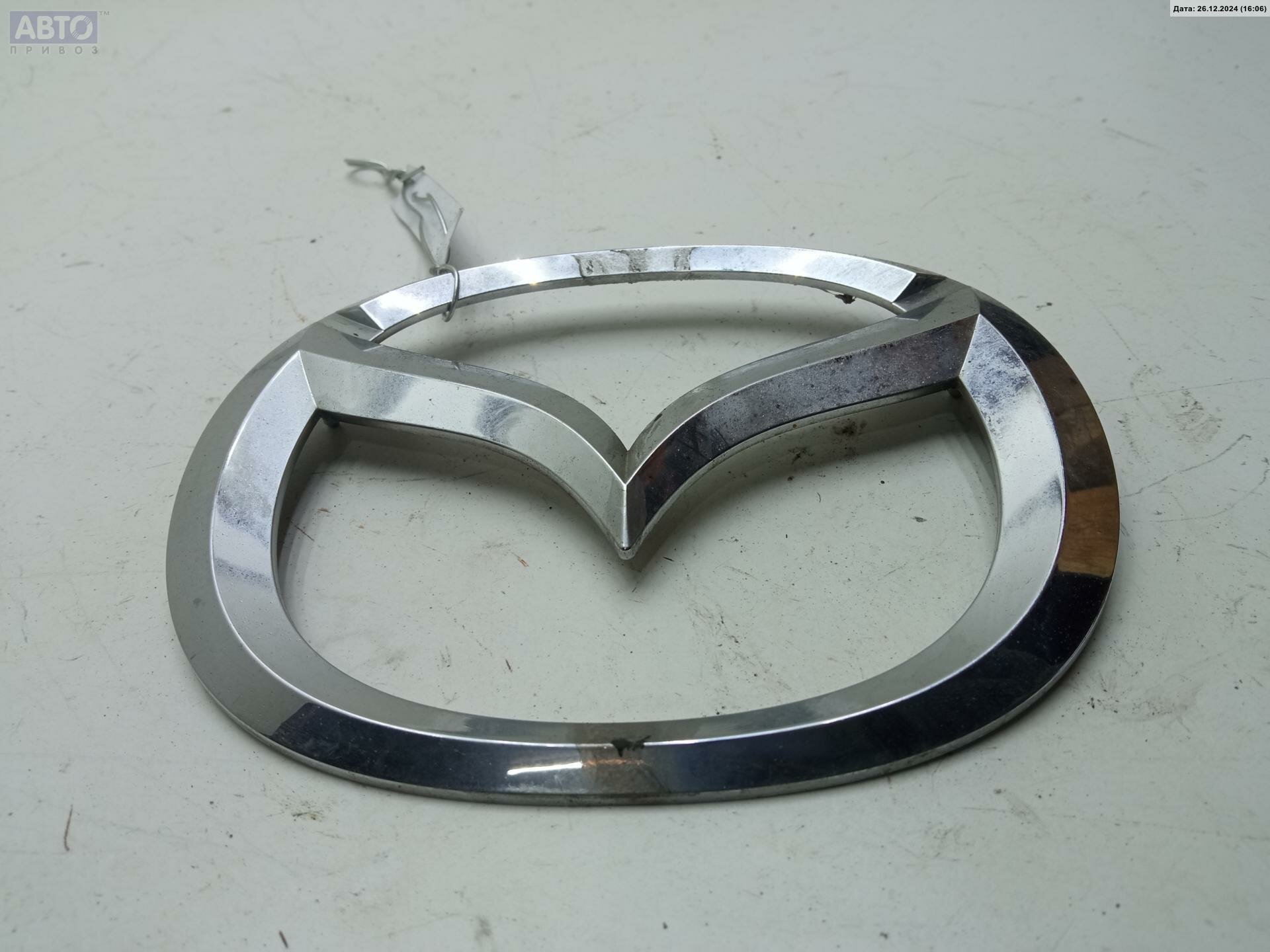 Эмблема Mazda 2
