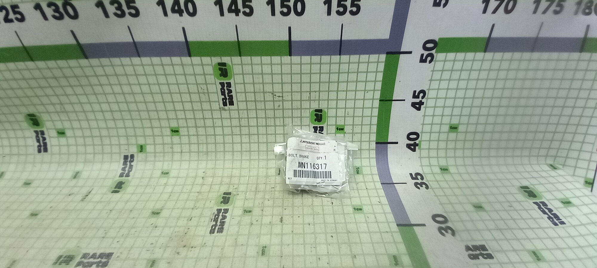 Болт заднего суппорта Mitsubishi Colt