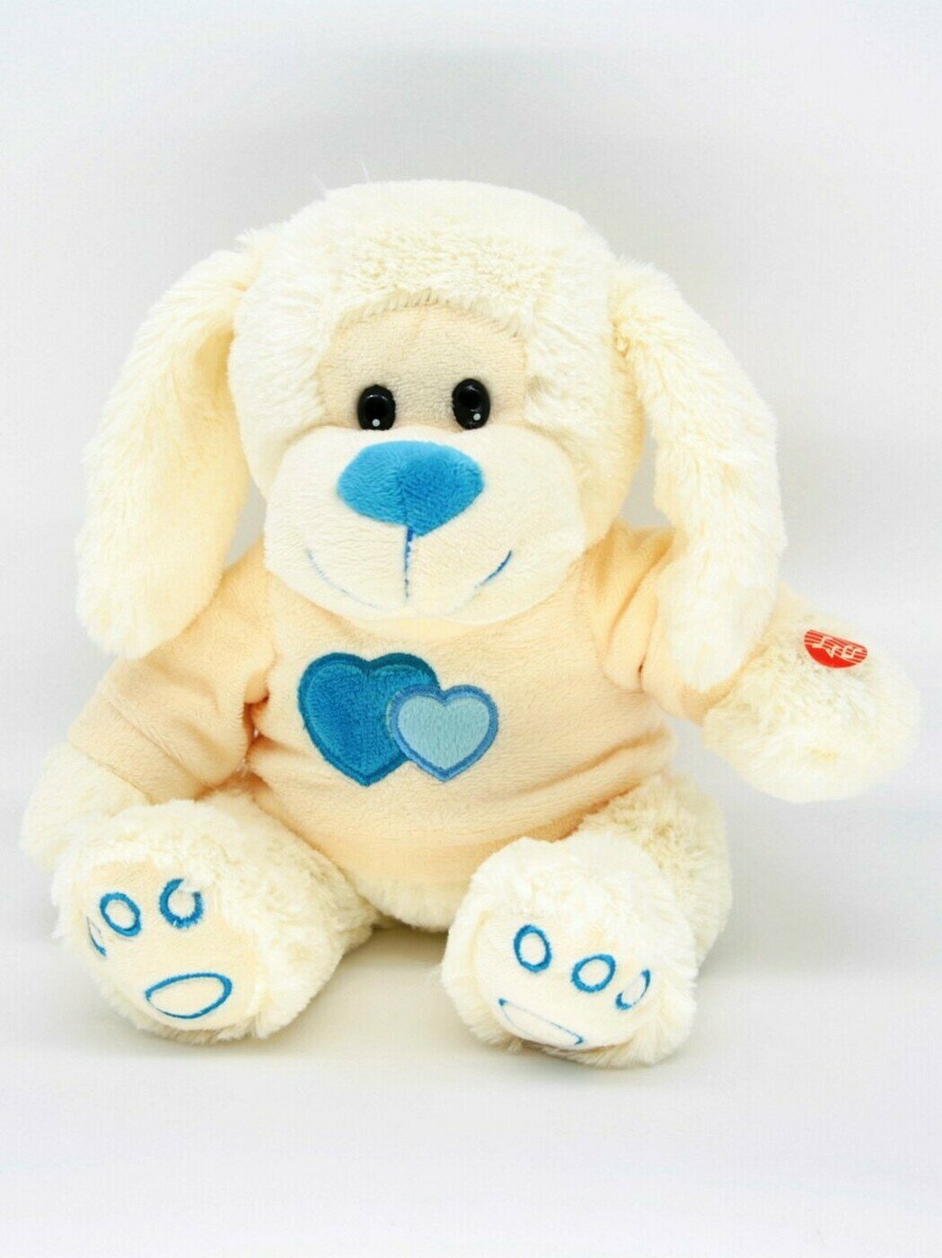 Мягкая игрушка Собачка поет "Если тебя любят" 22 см.