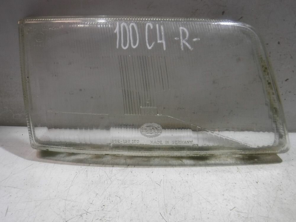 Стекло фары правой Audi 100 C4