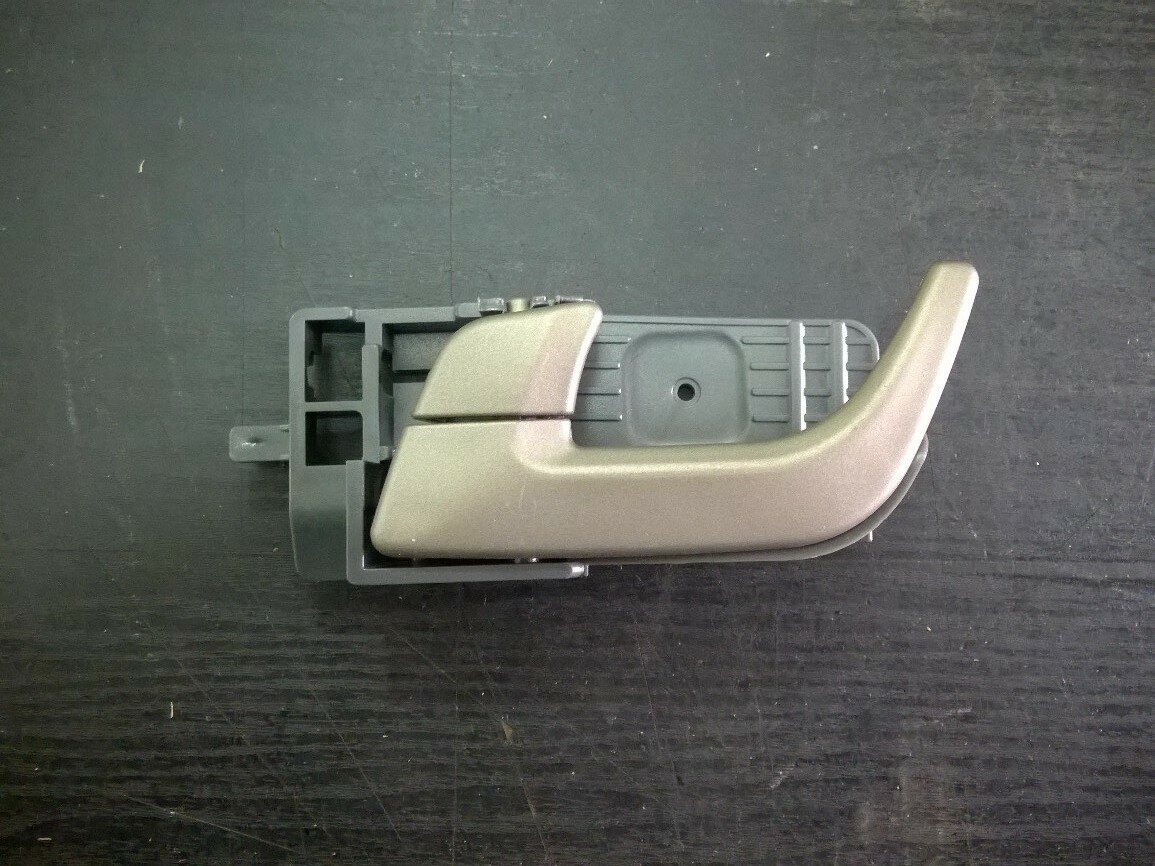 Ручка двери внутренняя левая (светлый салон) Geely Emgrand EC7 1068002029