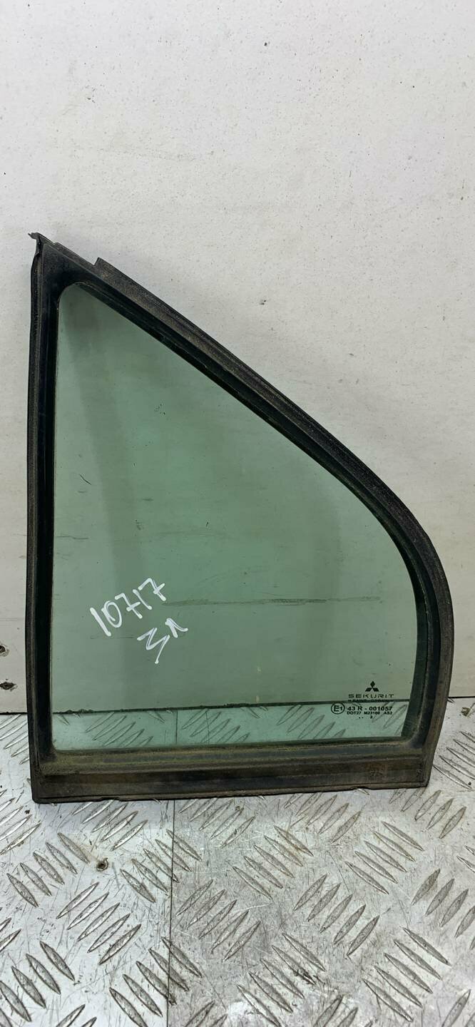 Стекло двери задней левой Mitsubishi Carisma рест. 2003