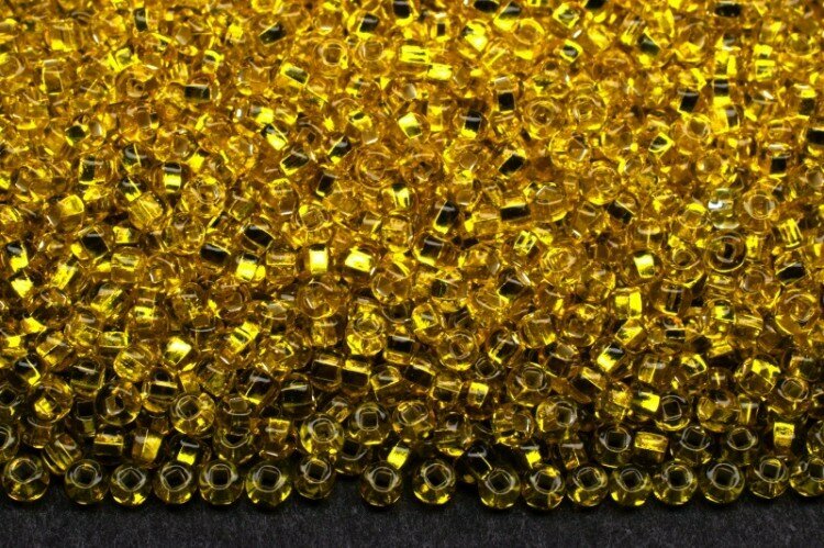 Бисер чешский PRECIOSA круглый 10/0 87010 желтый, серебряная линия внутри, квадратное отверстие, 2 сорт, 50г