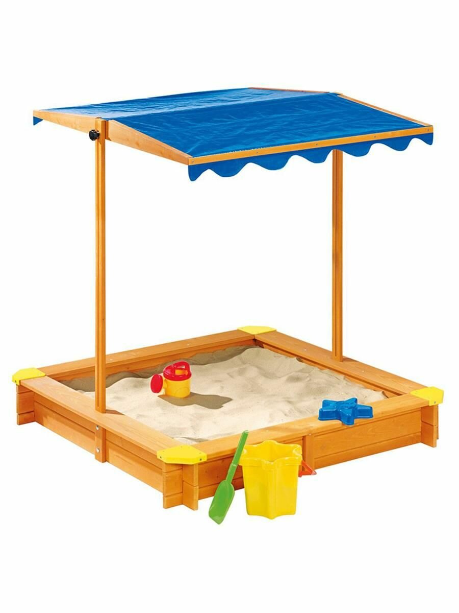 Дети играют в песчаном бассейне на открытом воздухе