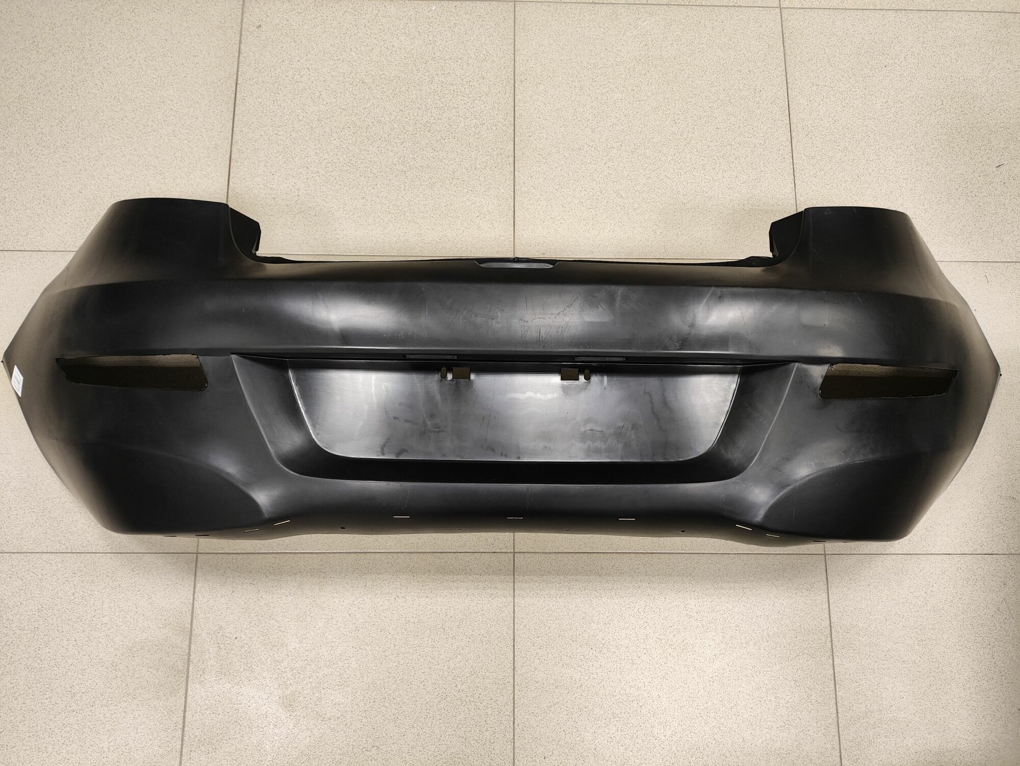 Бампер задний (с отверстиями под парктроники) Chery Bonus, Very A13 [1.5 16V 5MT хетчбэк] J152804500BADQ