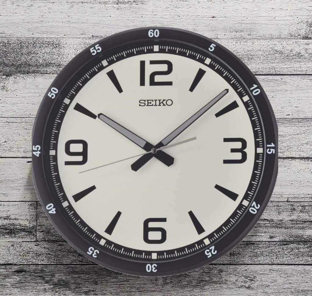 Черные кварцевые настенные часы с аналоговым циферблатом (стрелки) Seiko QXA809J — фото 1