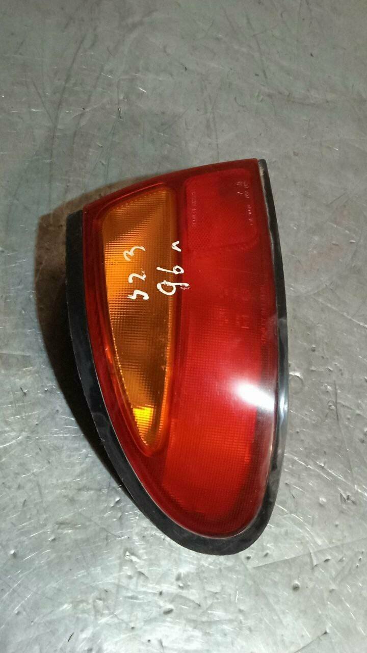 Фонарь задний левый Mazda 323 113028B