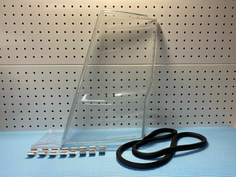 Стекло фары левое с установочным комплектом VOLVO FH12, FM стекло с резинкой (вольво ФШ12 ФМ)