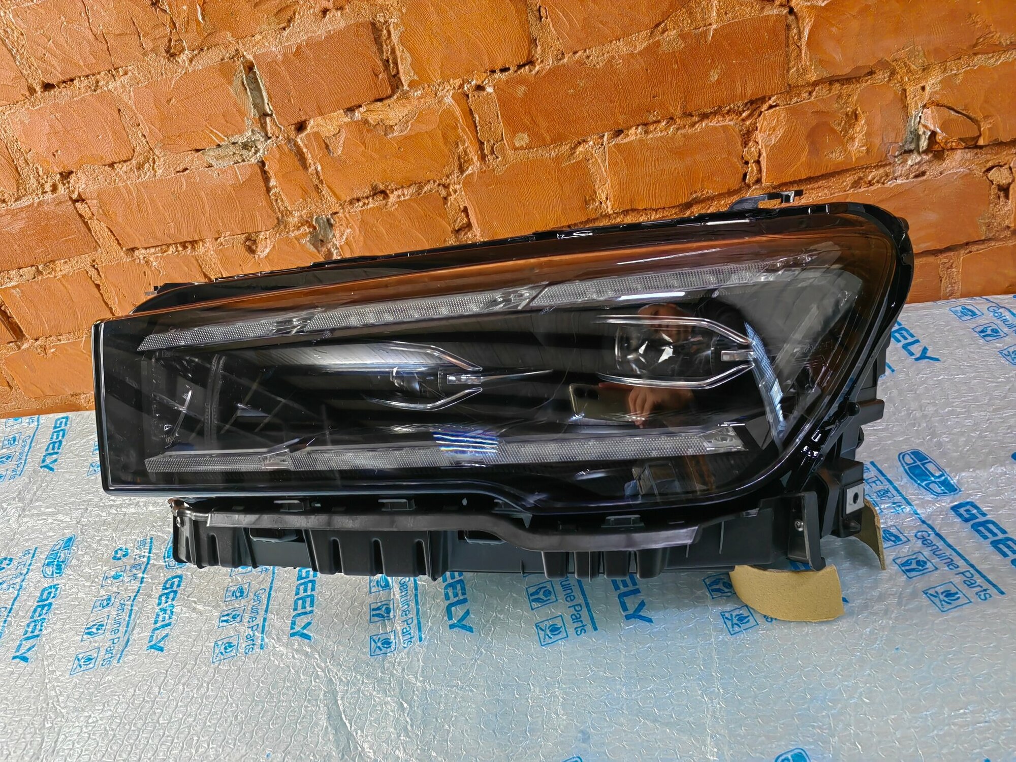 GEELY Фара левая Geely Monjaro 7051047300